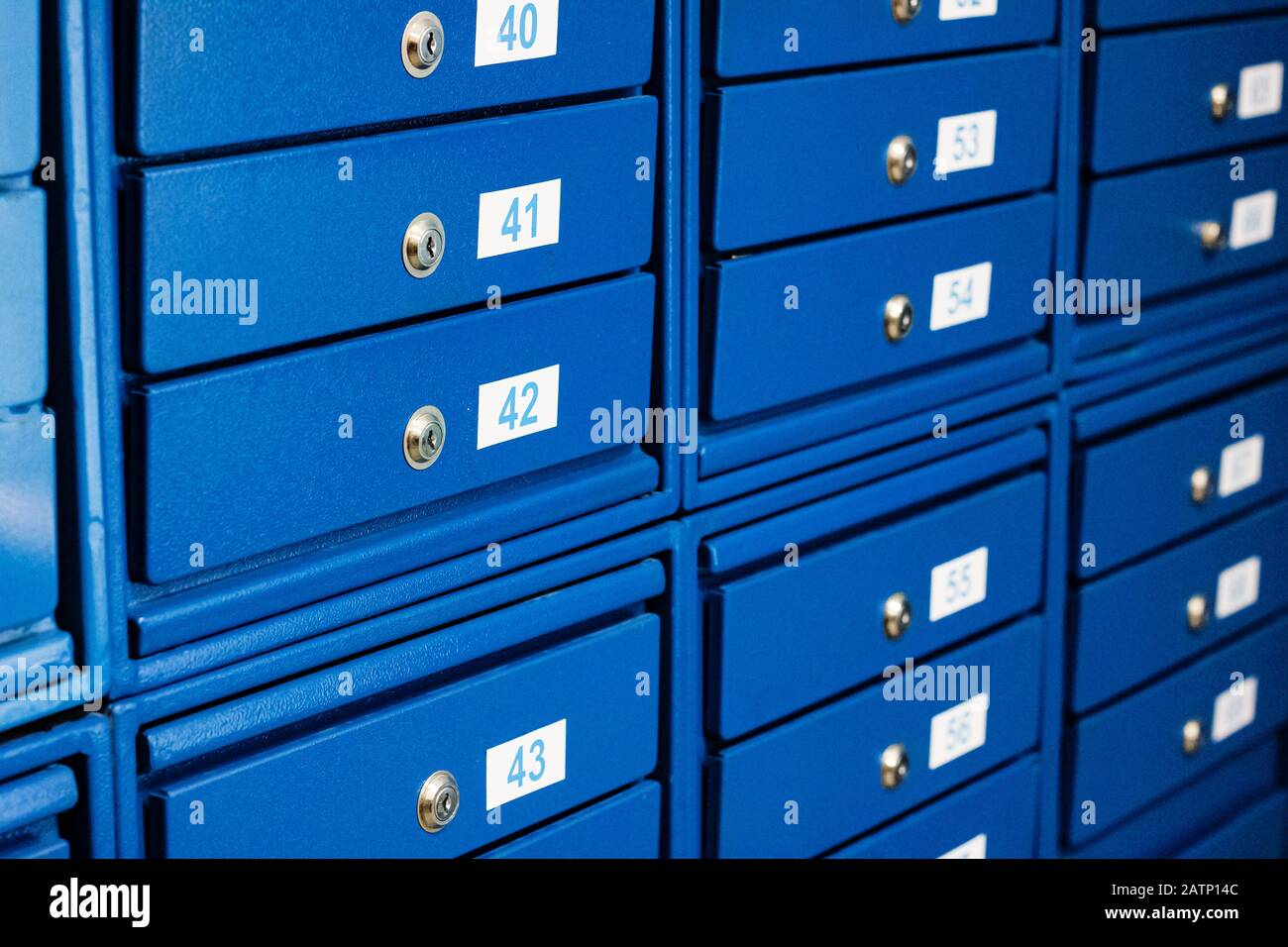 The blue mailboxes with numbers close up, background Stock Photo - Alamy