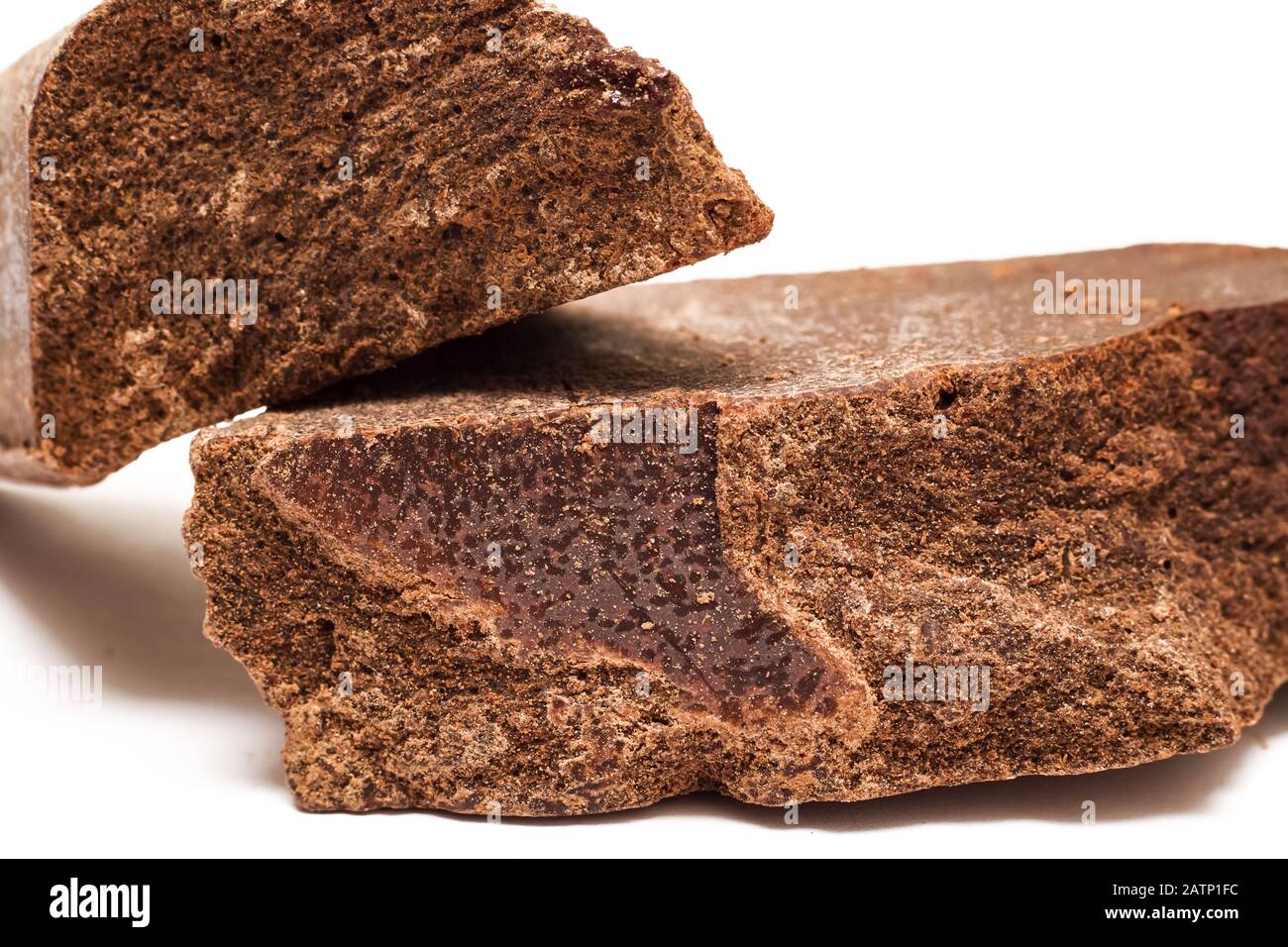 Large chunks of chocolate isolated on a ite background Stock Photo - Alamy