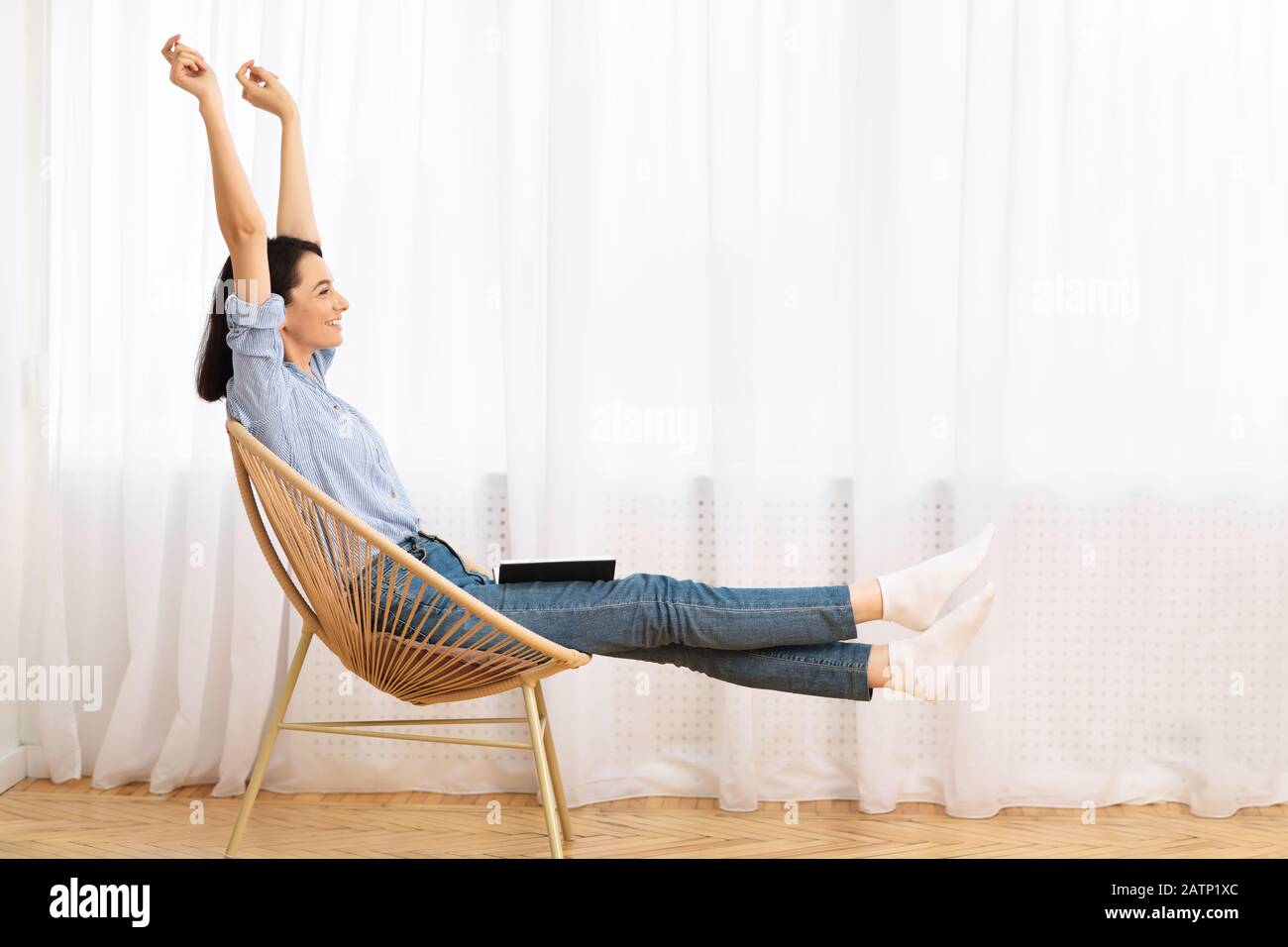 Girl having rest at home with a book Stock Photo - Alamy