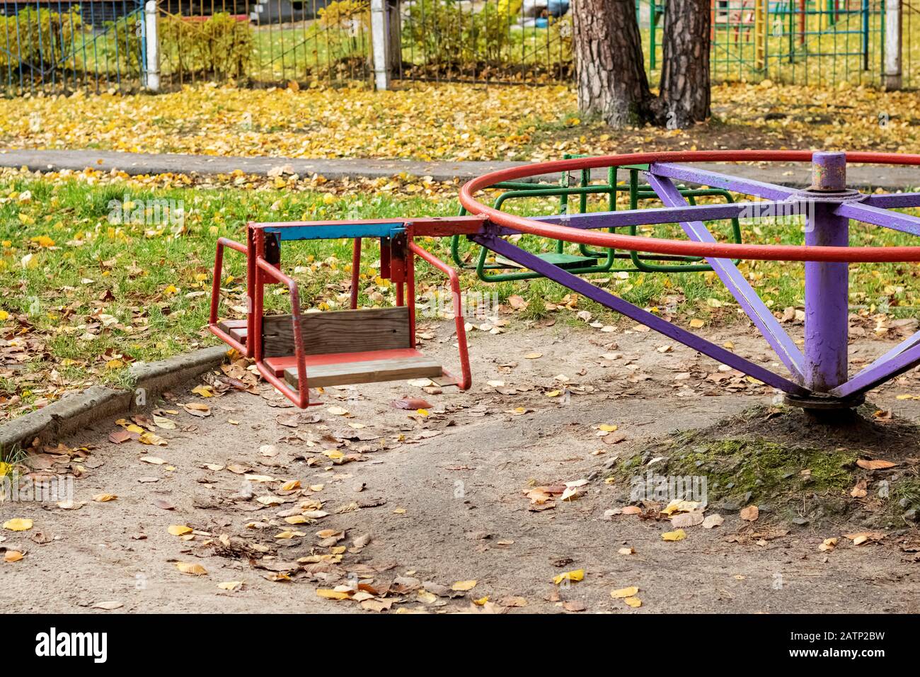 Carousel in the playground hi-res stock photography and images - Alamy