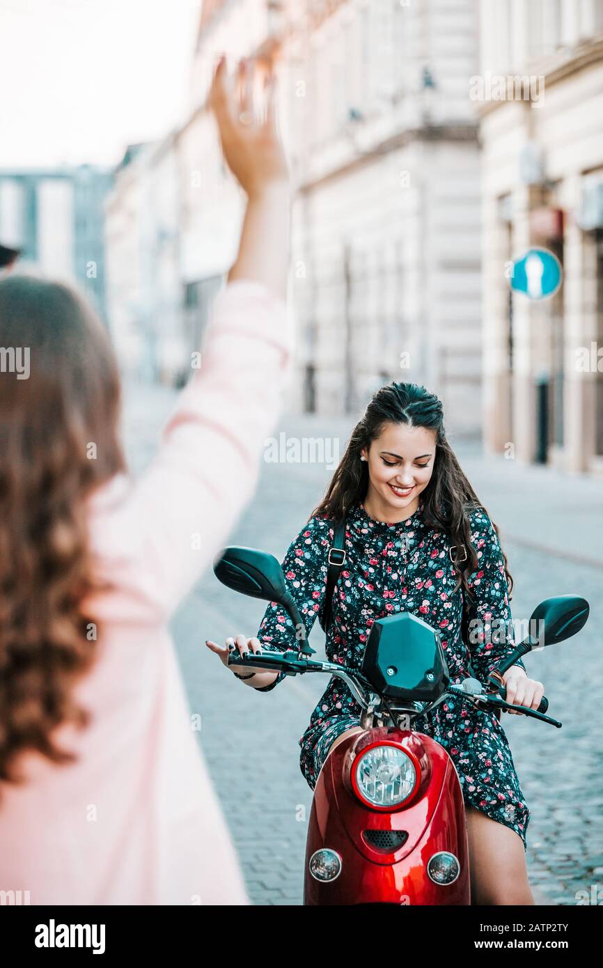 Teen girl waving goodbye hi-res stock photography and images - Alamy