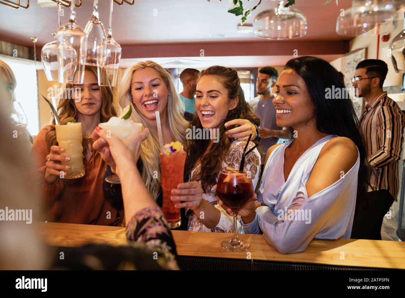 Group people standing at bar hi-res stock photography and images - Alamy
