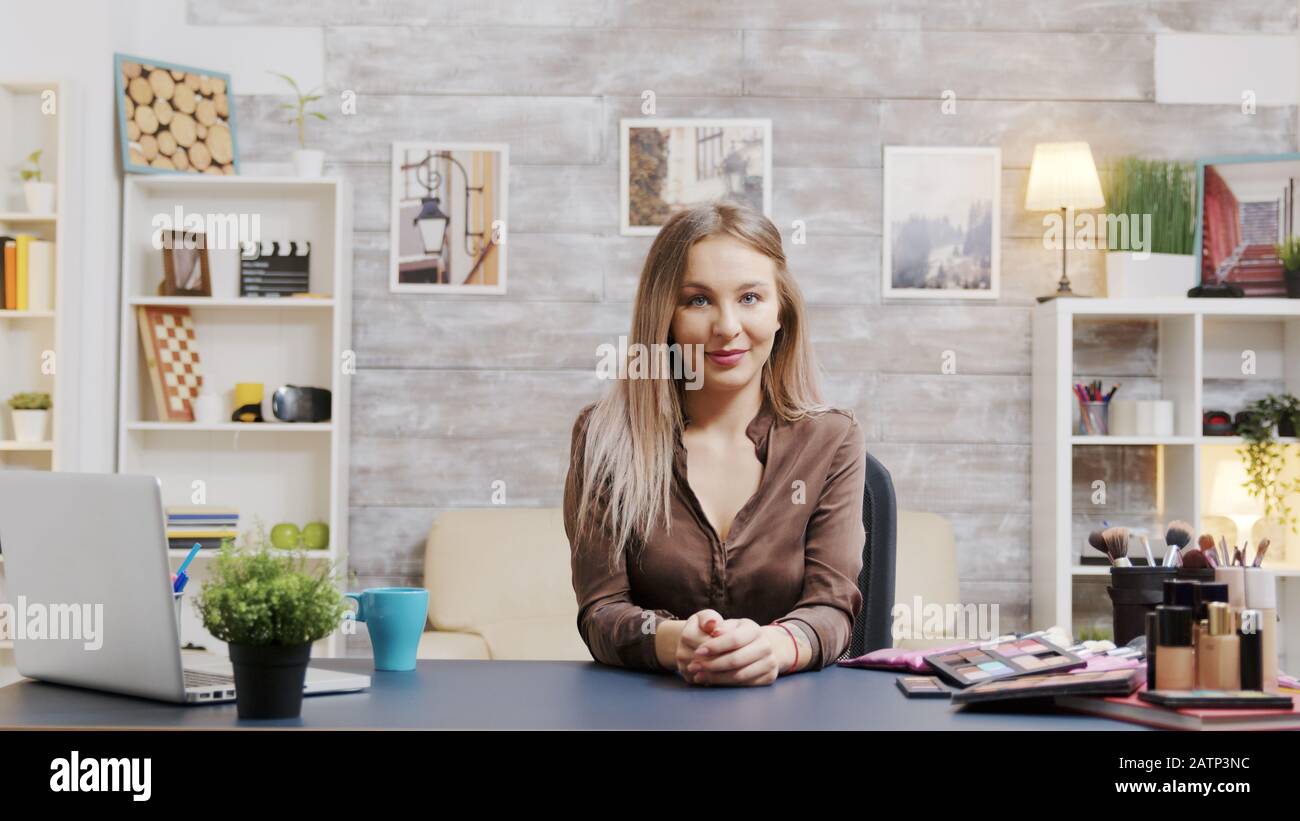 Famous beauty influencer presenting skin cosmetics on her vlog. Fashion ...