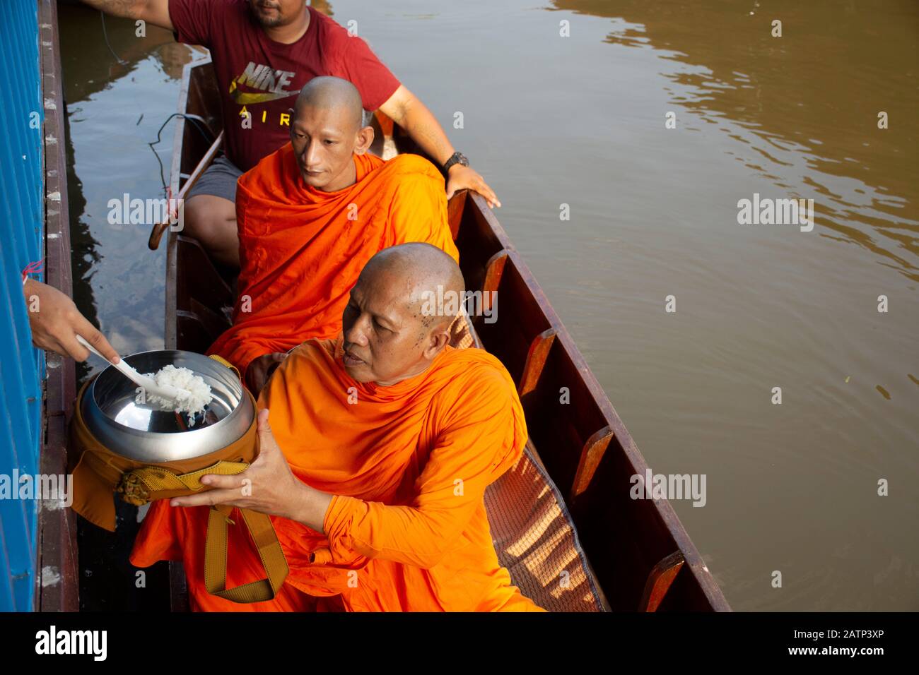 NONTHABURI, THAILAND - NOVEMBER 22 : Thai people praying put food and ...