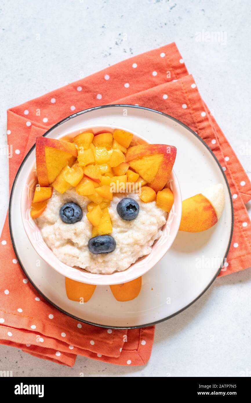 Cute Funny Fox Face Breakfast For Kids Oatmeal Porridge Stock Photo - Alamy