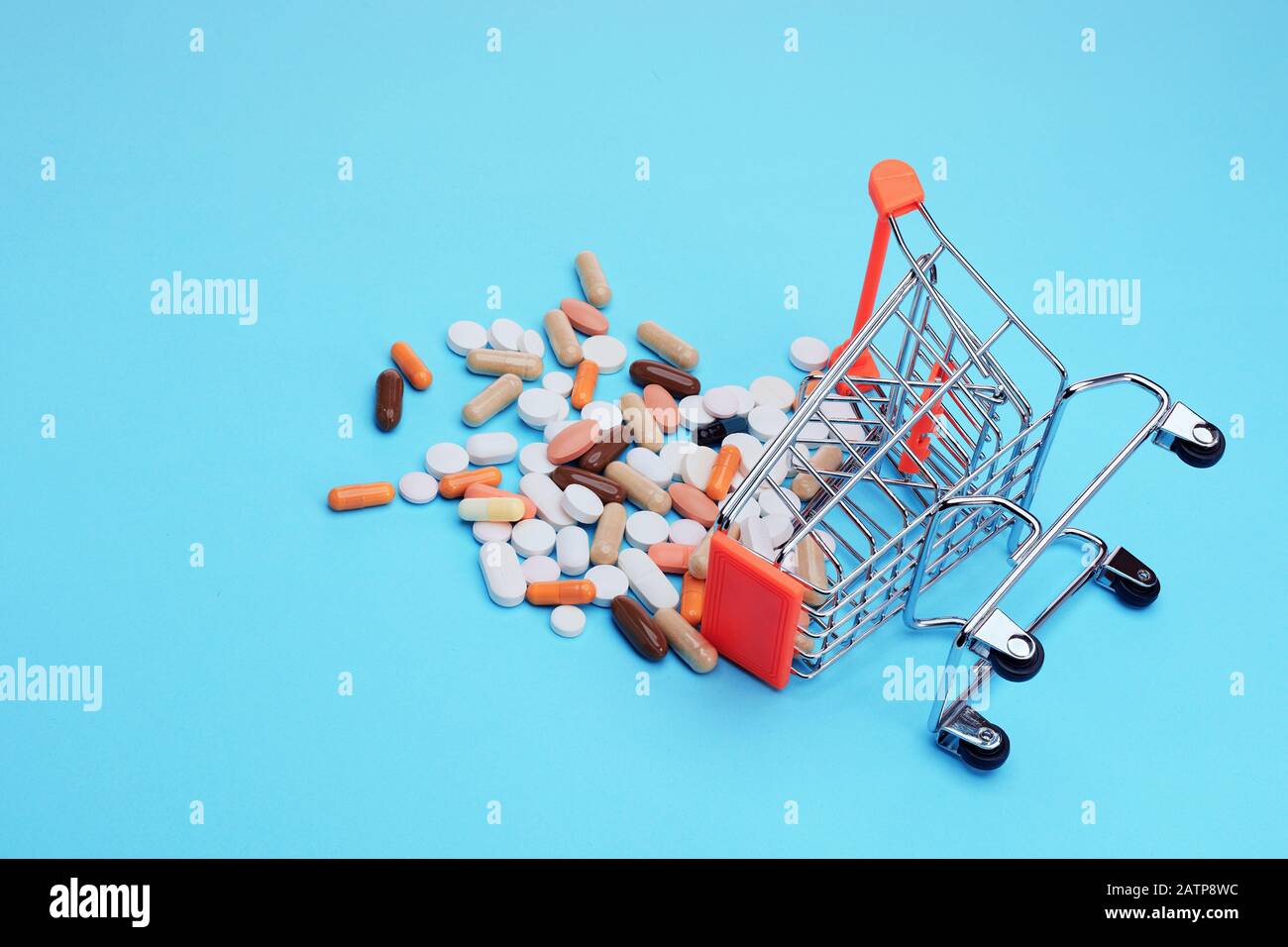Shopping cart full of medical pills fell down with medical drugs ...