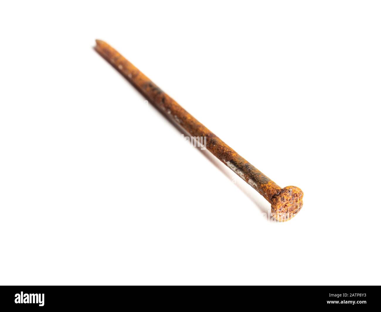 rusty nail on white background Stock Photo - Alamy
