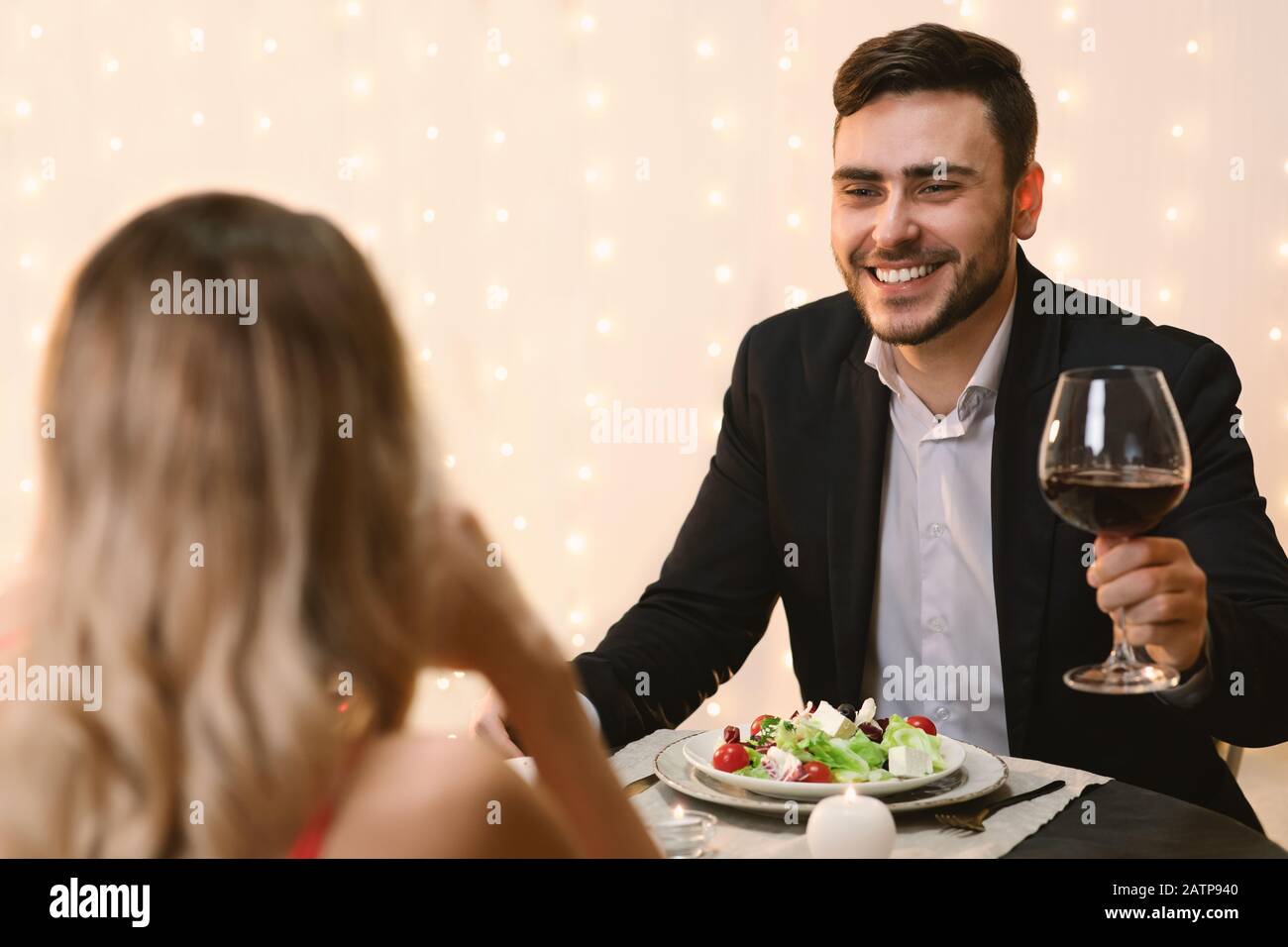 Handsome Man Making Toast On Romantic Dinner With His Girlfriend Stock ...