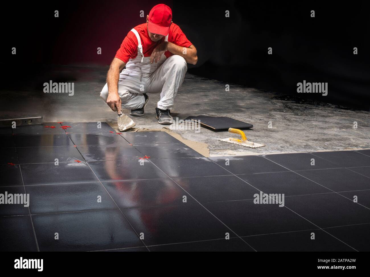 Construction worker kneels hi-res stock photography and images - Alamy