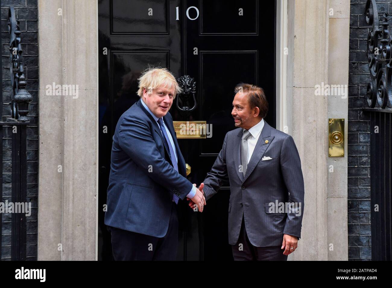 London, UK. 4 February 2020. Hassanal Bolkiah, the Sultan of Brunei, (R ...