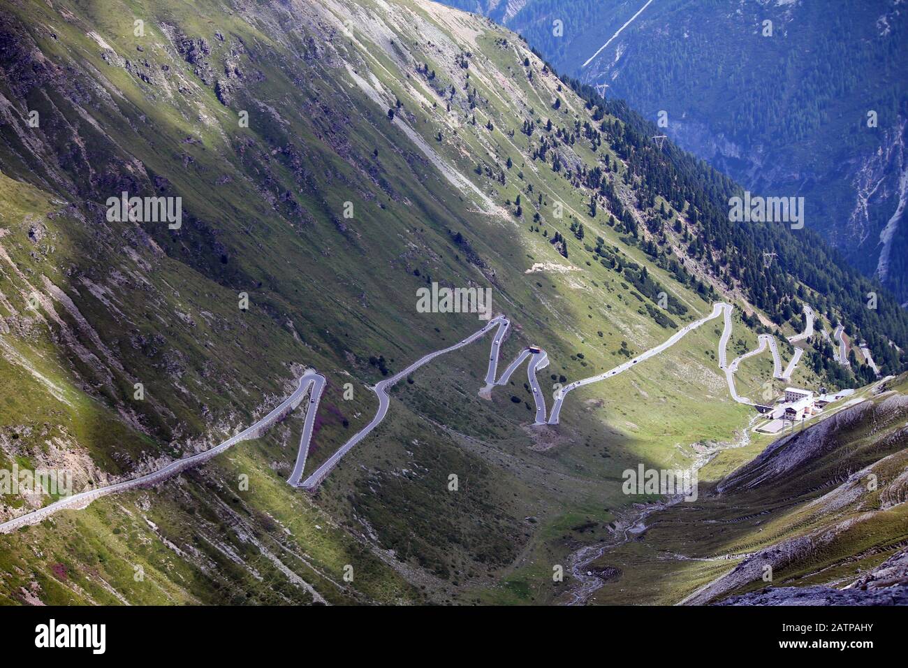 Switchbacks of the Italian highest mountain pass Stock Photo - Alamy
