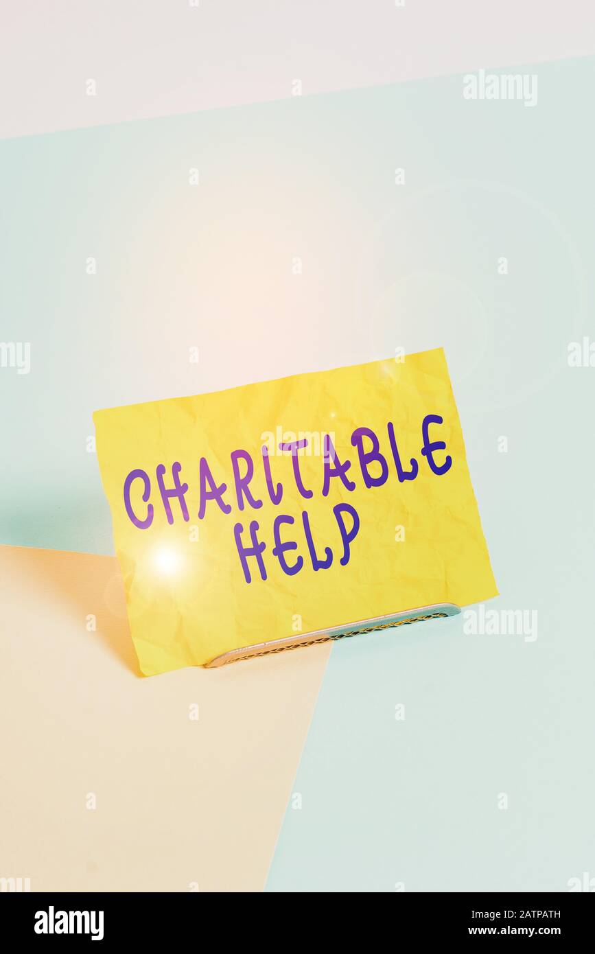 Handwriting text writing Charitable Help. Conceptual photo system of ...