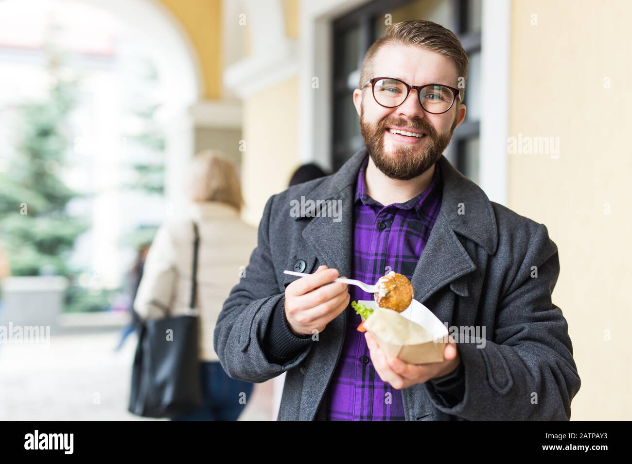 Fast Food And Meal Concept Young Man Eating Take Away Food On The
