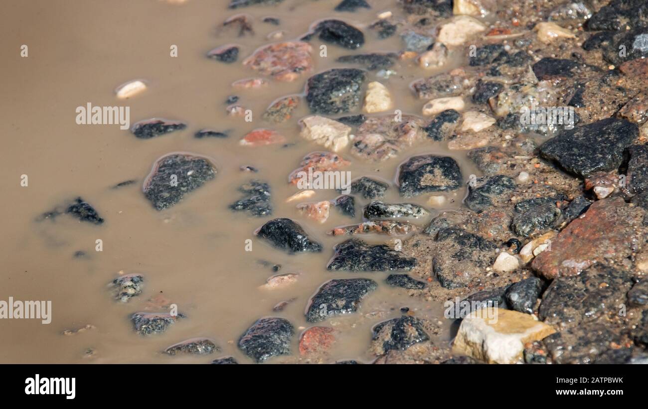 Oil in water puddle hi-res stock photography and images - Alamy