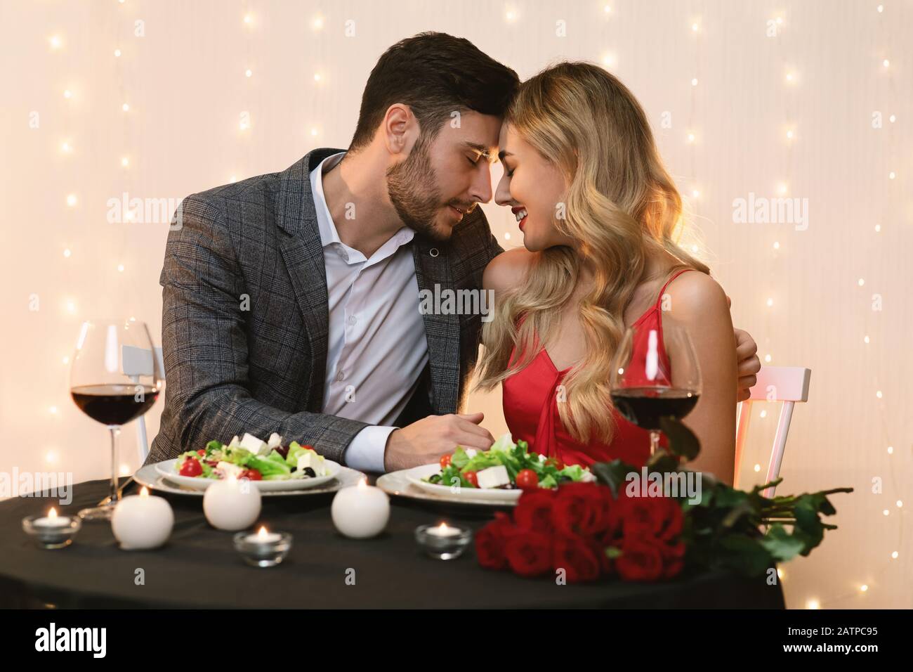 Loving Young Couple Bonding On Romantic Date In Restaurant Stock Photo ...