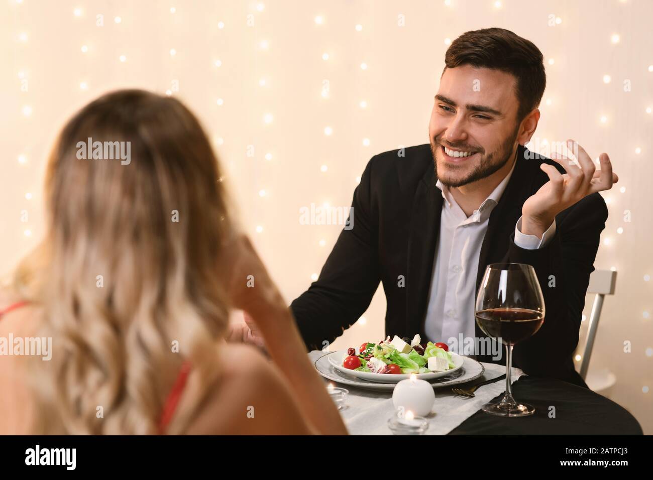 Couple enjoying romantic dinner in hi-res stock photography and images ...