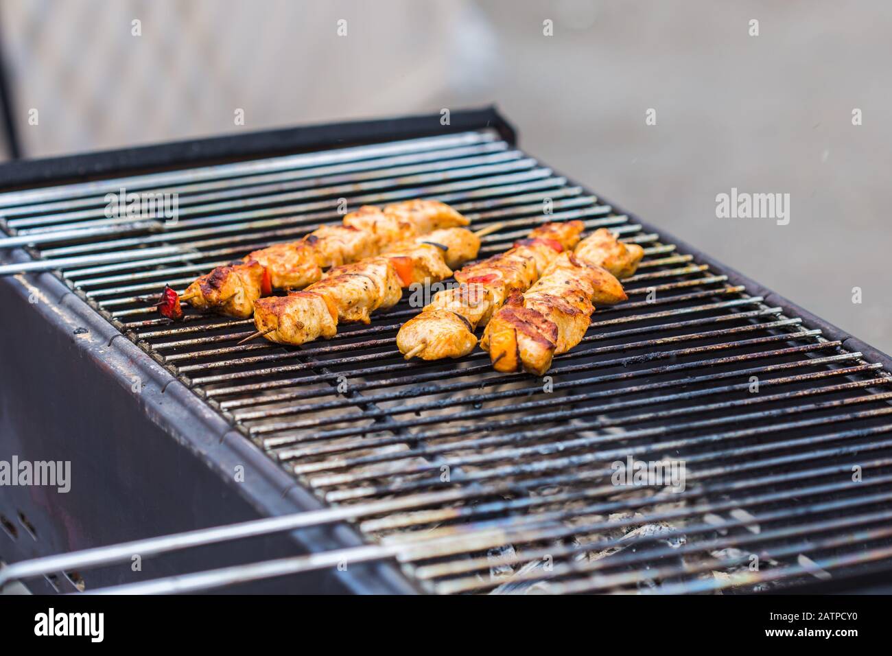 Delicious bbq kebab grilling on open grill, outdoor kitchen. Food ...