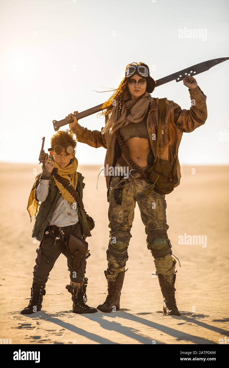 Woman holding gun sword hi-res stock photography and images - Alamy