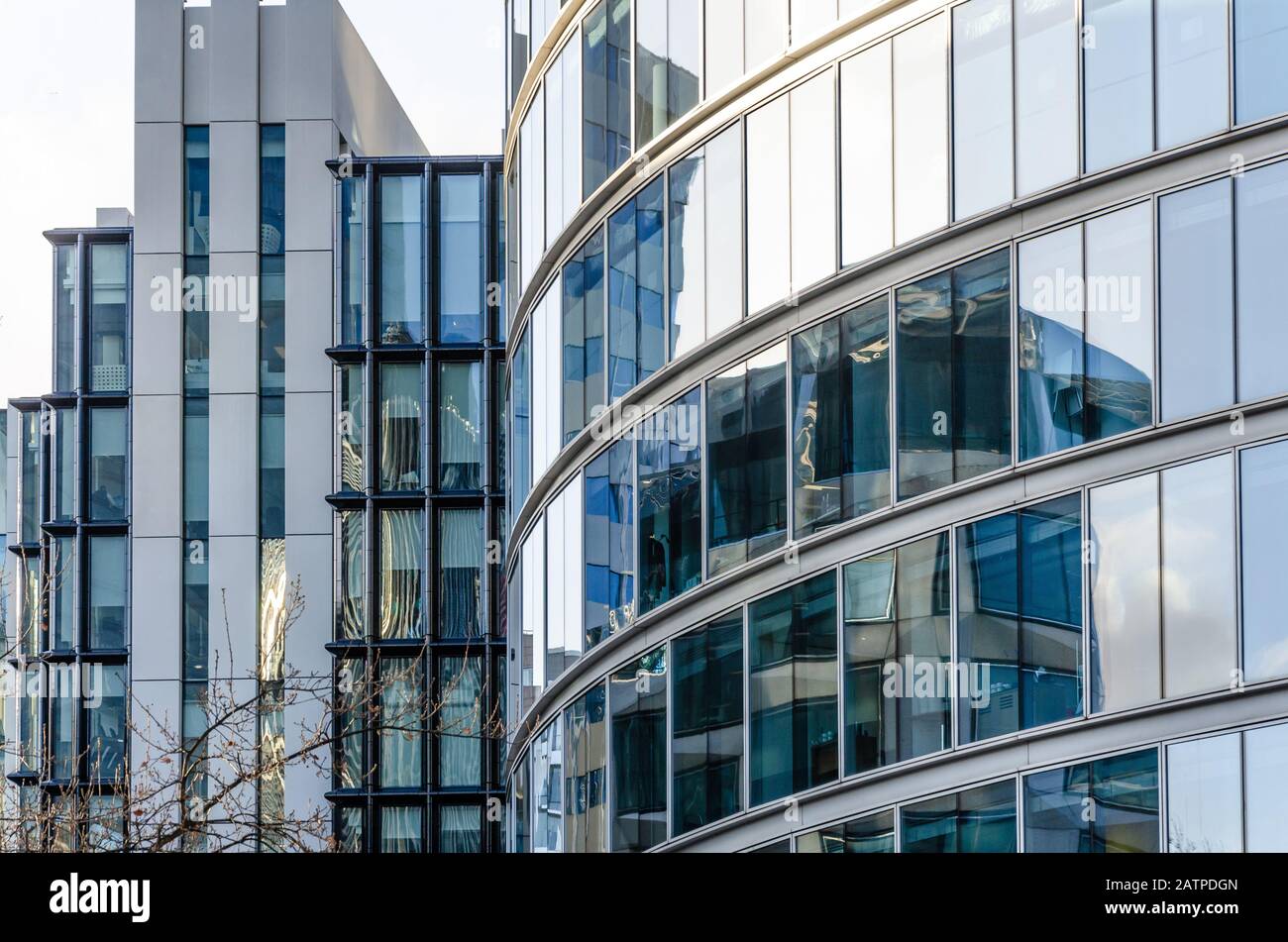 Close up view of detail on a modern glass building with reflective ...