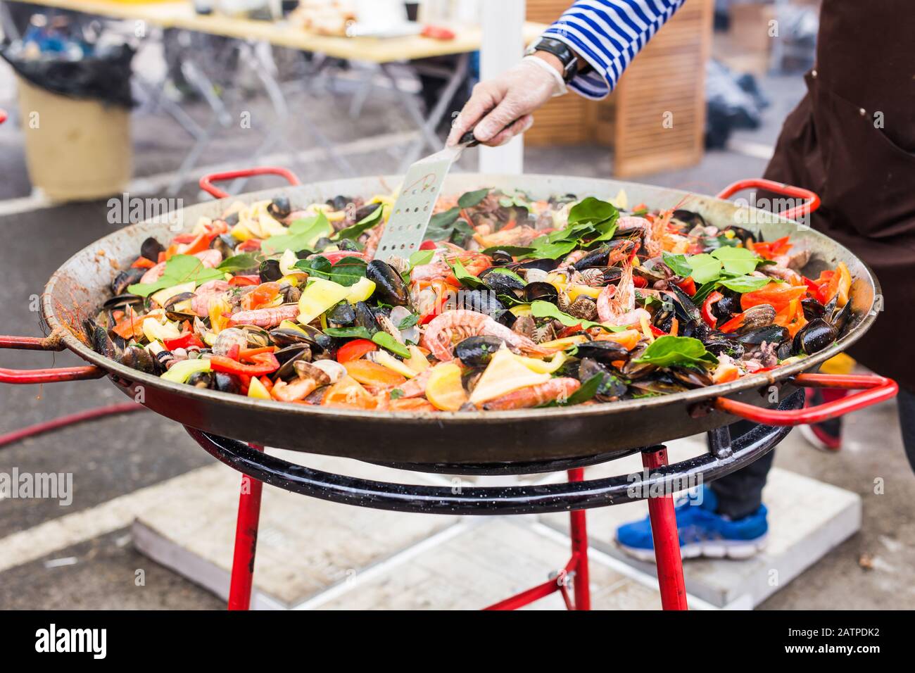 Spanish paella prepared in the street restaurant Stock Photo - Alamy