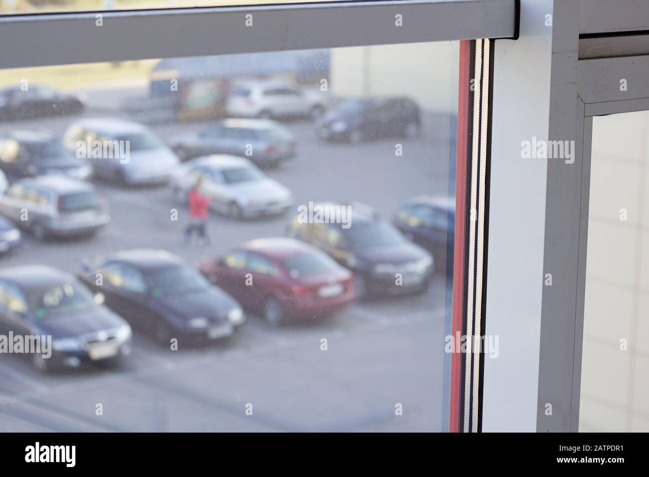 View from the window to the parking lot with cars Stock Photo - Alamy