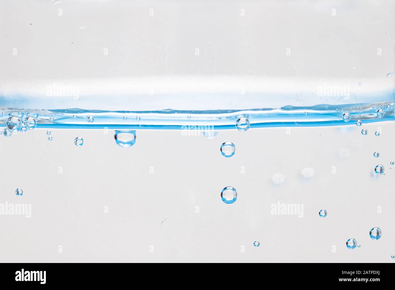 Water surface with bubbles on a white background Stock Photo - Alamy