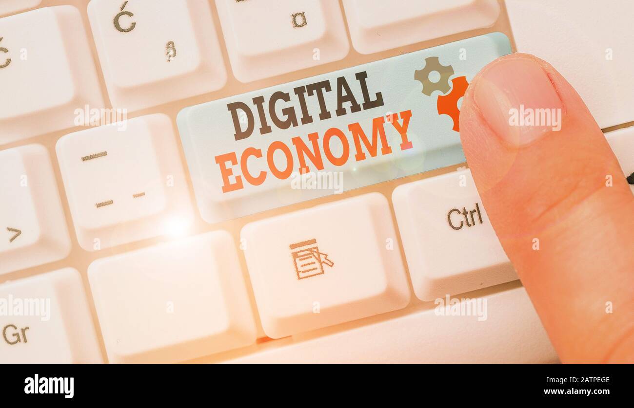 Writing note showing Digital Economy. Business concept for economic ...