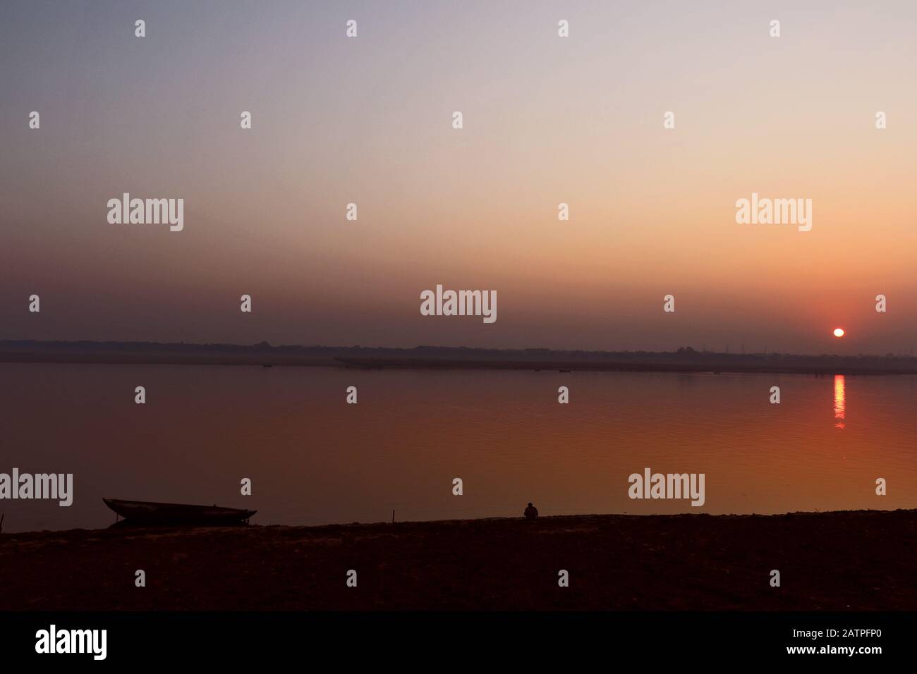 Sun rise in Varanasi opposite Ganga river Stock Photo - Alamy