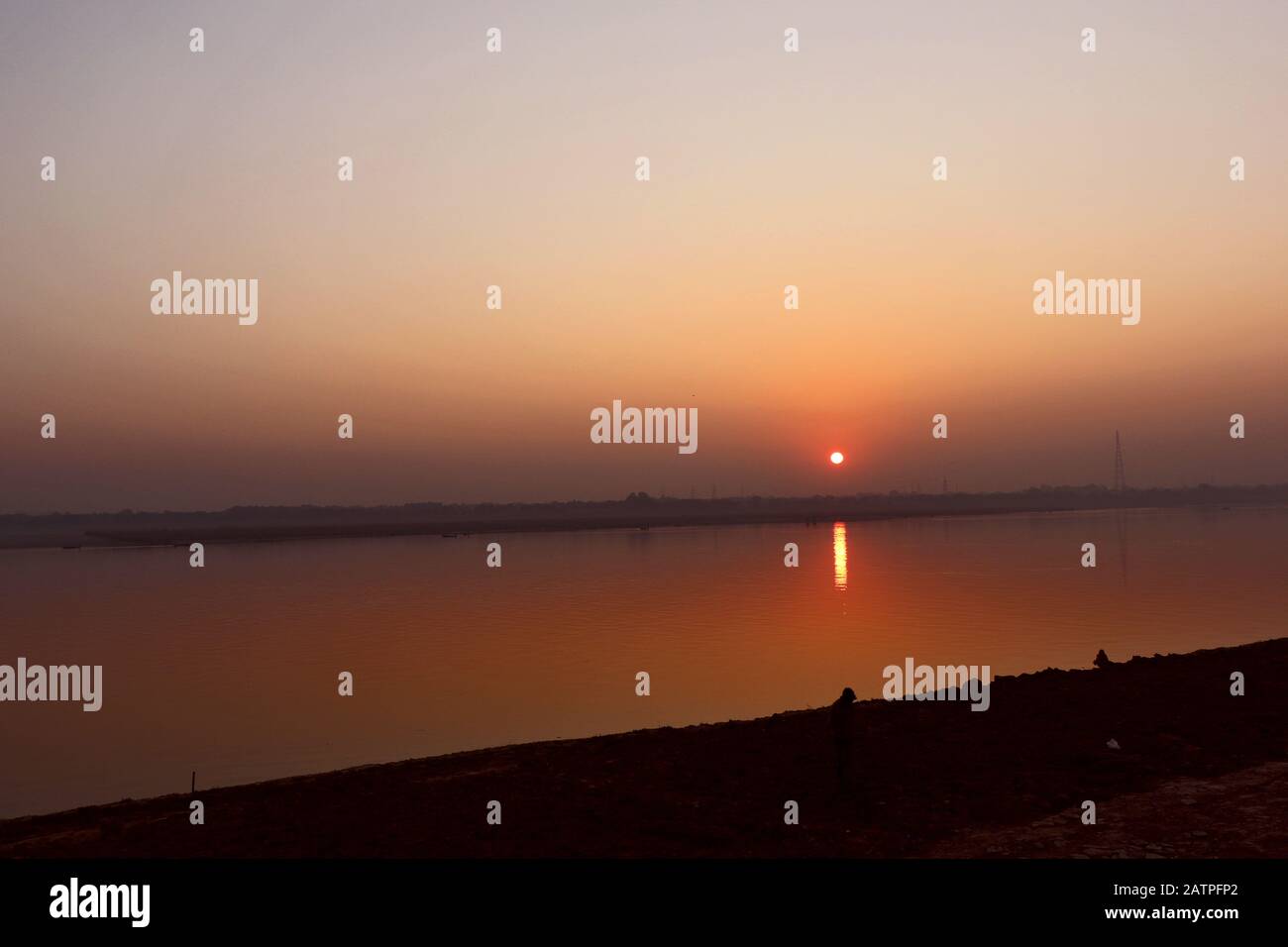 Sun rise in Varanasi opposite Ganga river Stock Photo - Alamy