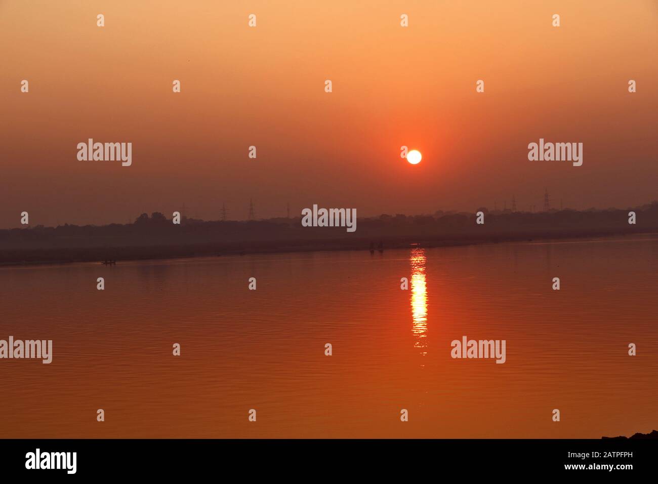 Sun rise in Varanasi opposite Ganga river Stock Photo - Alamy