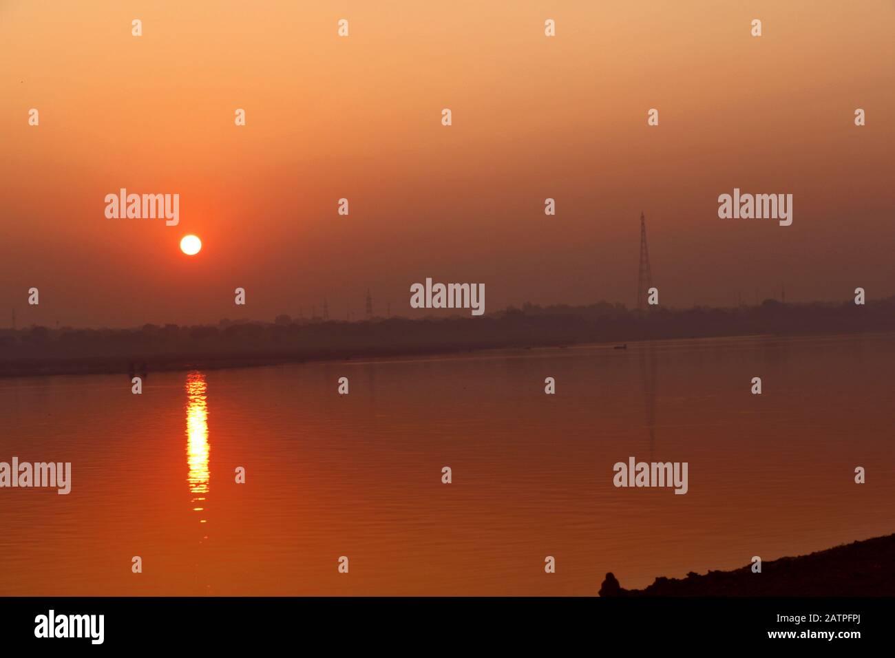 Sun rise in Varanasi opposite Ganga river Stock Photo - Alamy