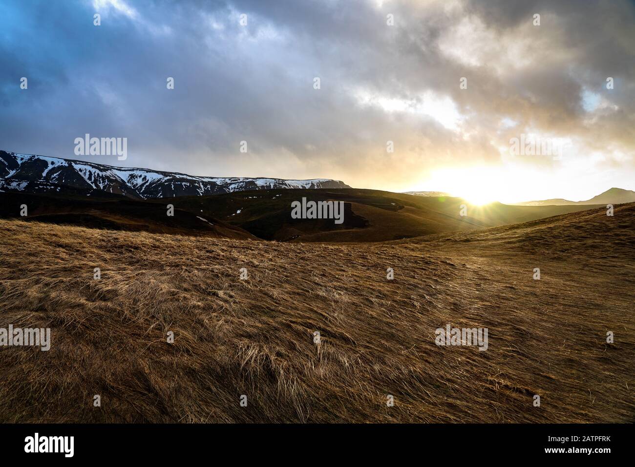 autumn winter landscape in Iceland with hills mountains and grass ...