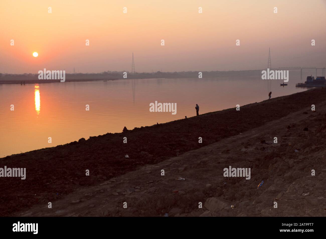 Sun rise in Varanasi opposite Ganga river Stock Photo - Alamy