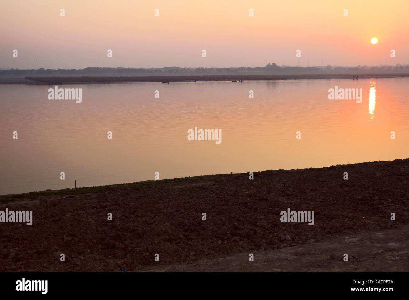 Sun rise in Varanasi opposite Ganga river Stock Photo - Alamy