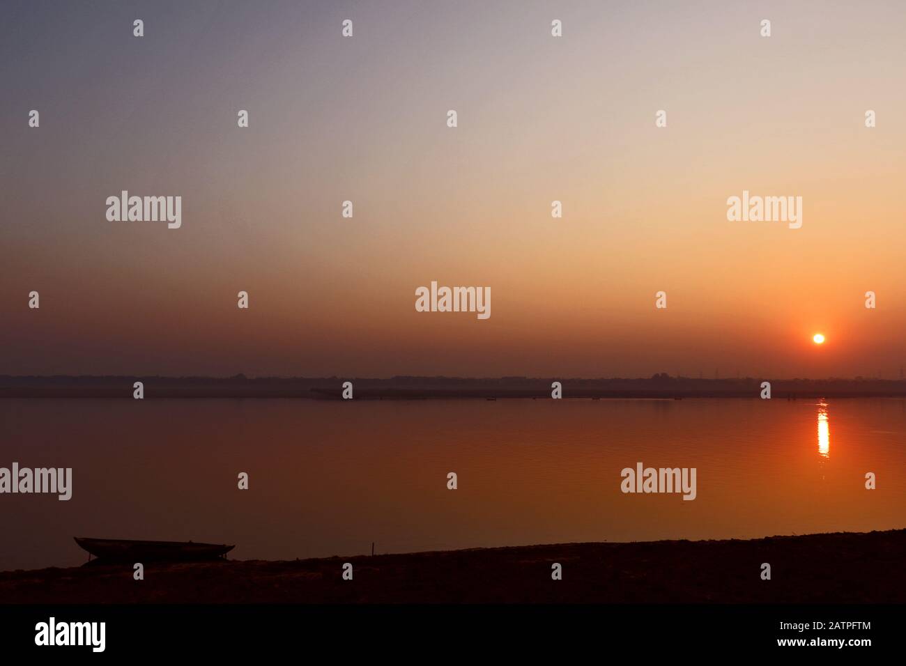 Sun rise in Varanasi opposite Ganga river Stock Photo - Alamy