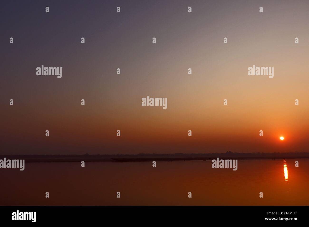 Sun rise in Varanasi opposite Ganga river Stock Photo - Alamy