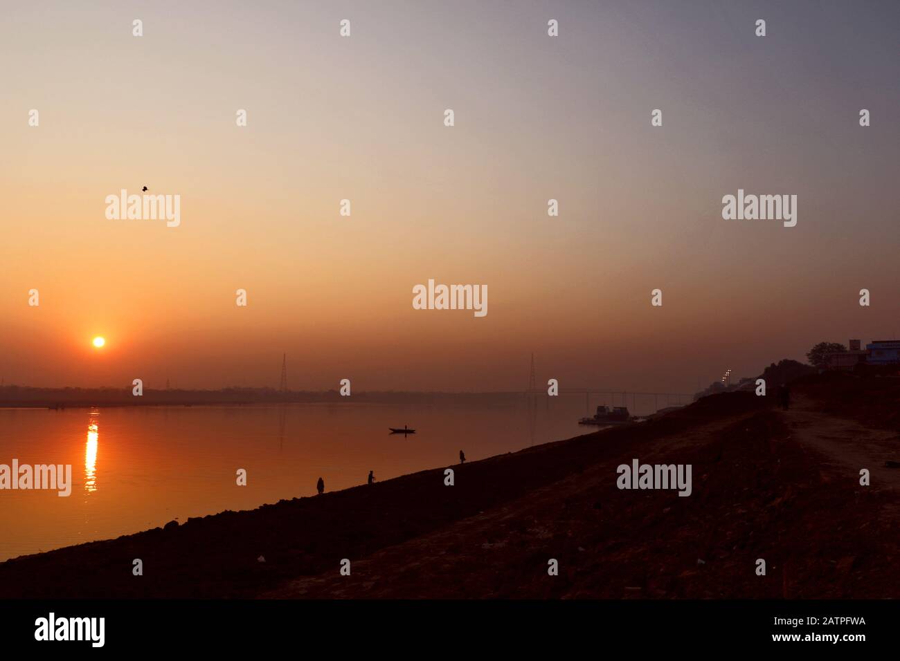Sun rise in Varanasi opposite Ganga river Stock Photo - Alamy