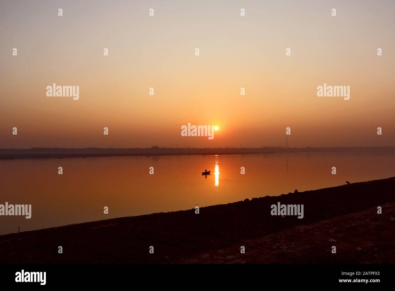 Sun rise in Varanasi opposite Ganga river Stock Photo - Alamy