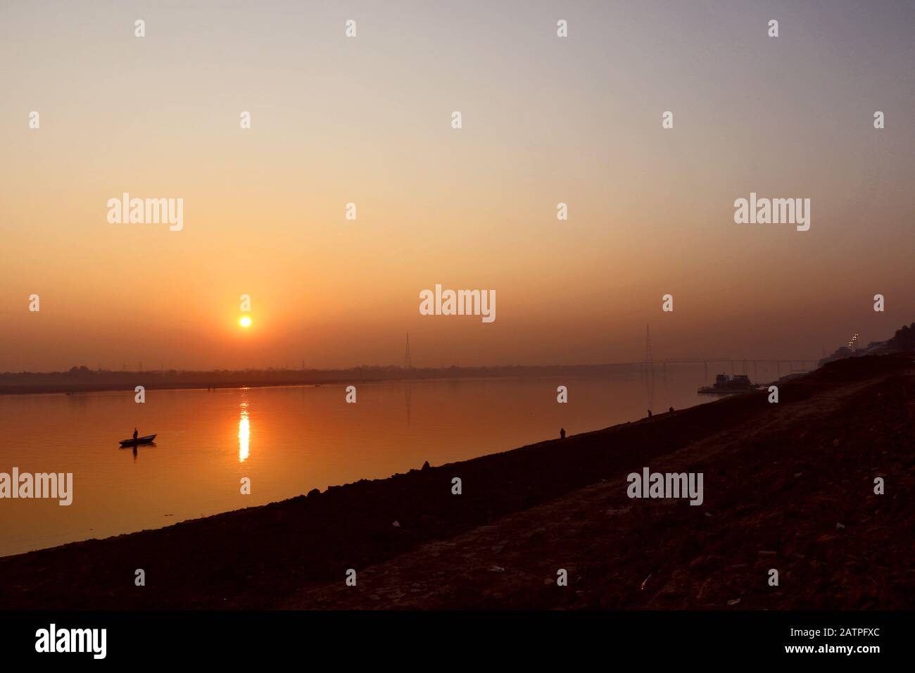 Sun rise in Varanasi opposite Ganga river Stock Photo - Alamy
