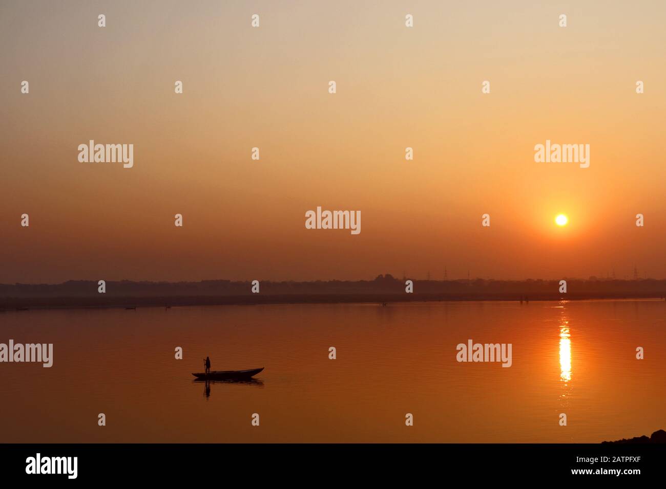 Sun rise in Varanasi opposite Ganga river Stock Photo - Alamy
