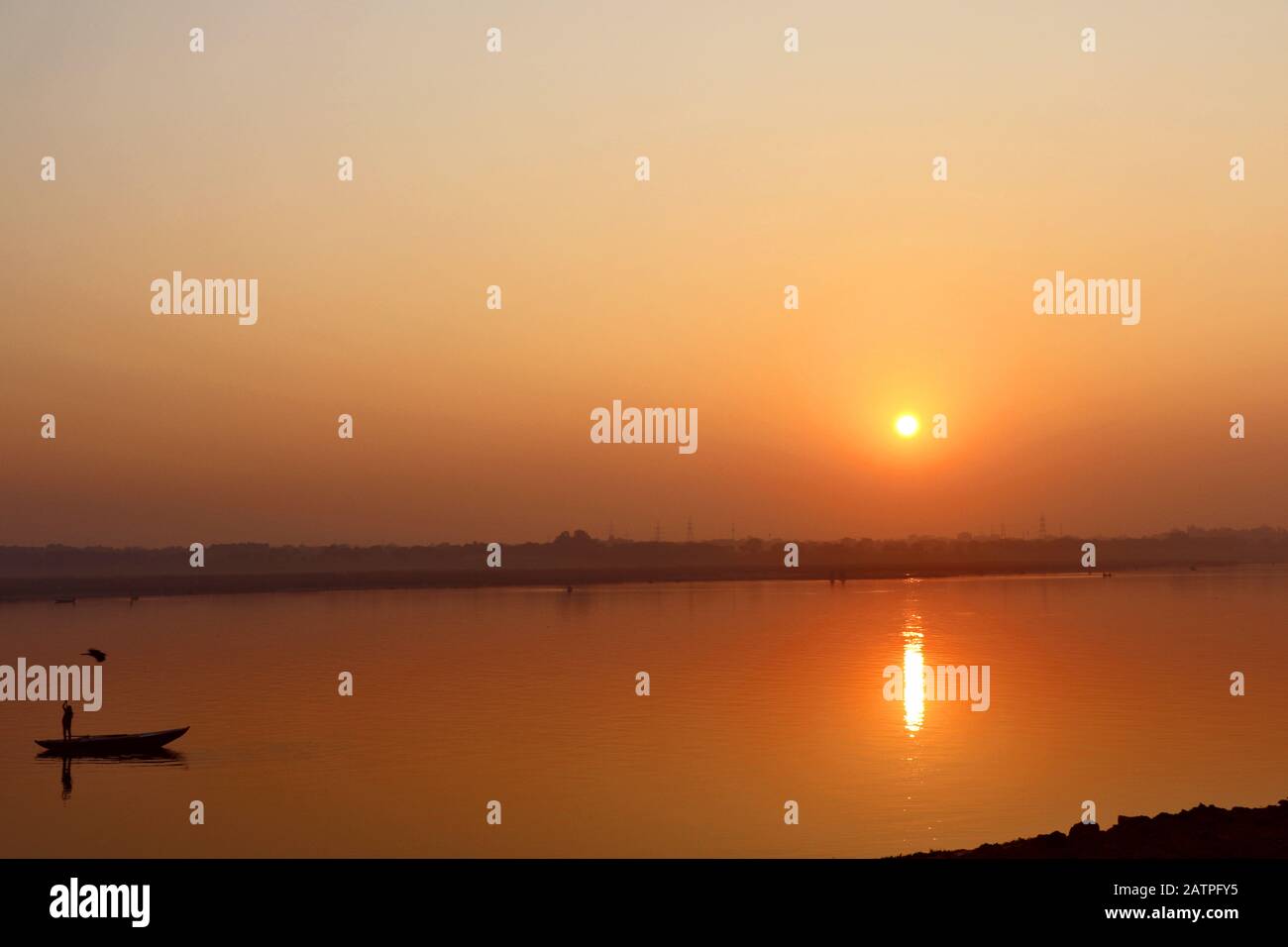 Sun rise in Varanasi opposite Ganga river Stock Photo - Alamy