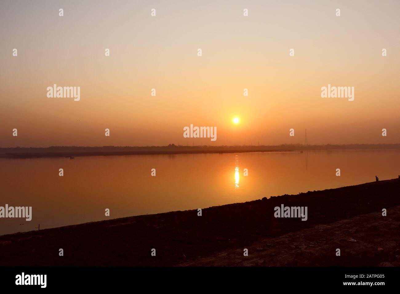 Sun rise in Varanasi opposite Ganga river Stock Photo - Alamy