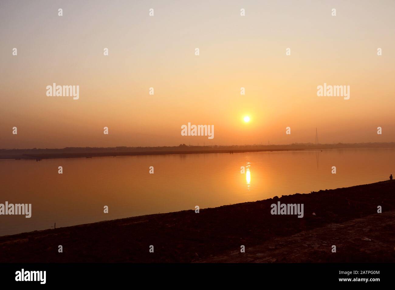 Sun rise in Varanasi opposite Ganga river Stock Photo - Alamy