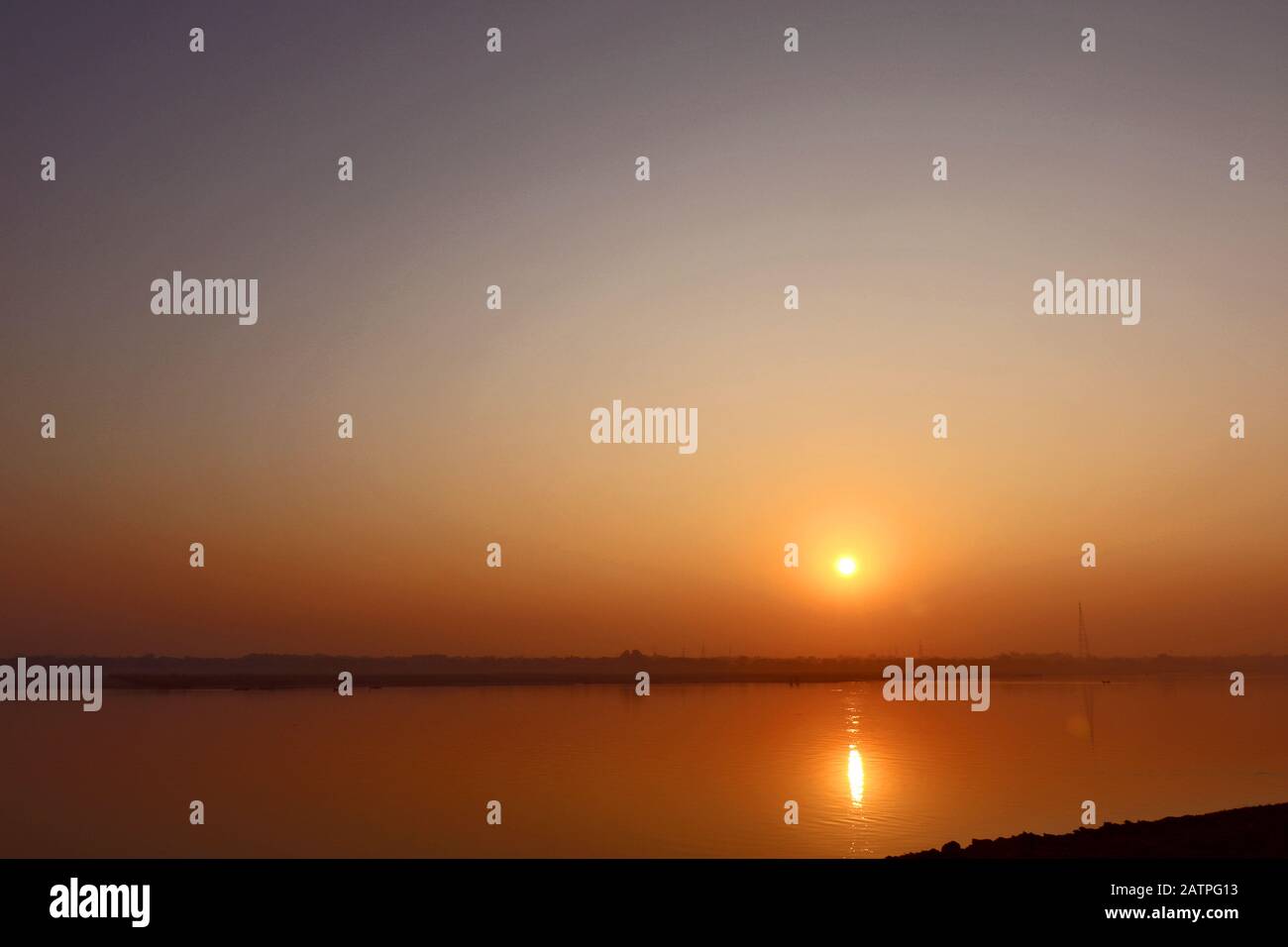 Sun rise in Varanasi opposite Ganga river Stock Photo - Alamy
