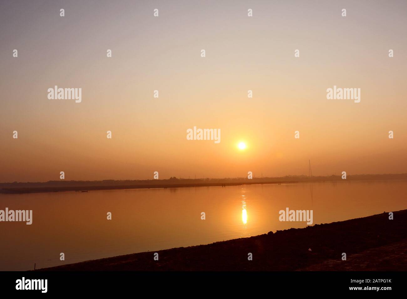 Sun rise in Varanasi opposite Ganga river Stock Photo - Alamy