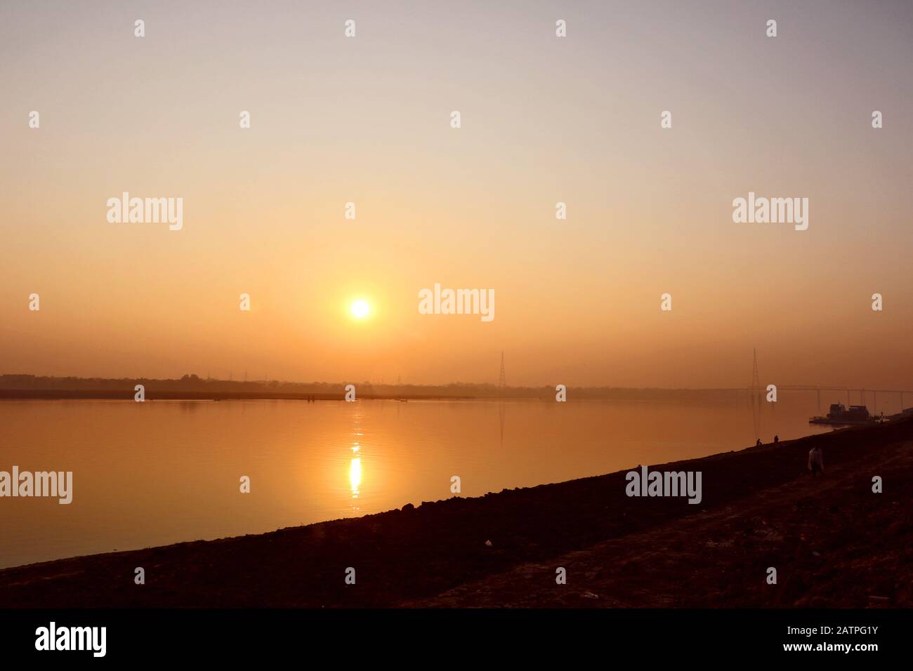 Sun rise in Varanasi opposite Ganga river Stock Photo - Alamy