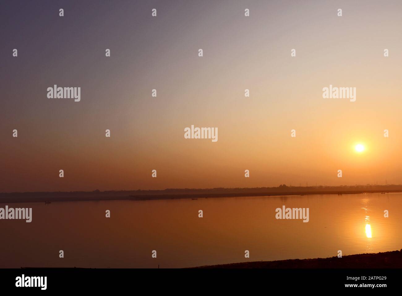 Sun rise in Varanasi opposite Ganga river Stock Photo - Alamy