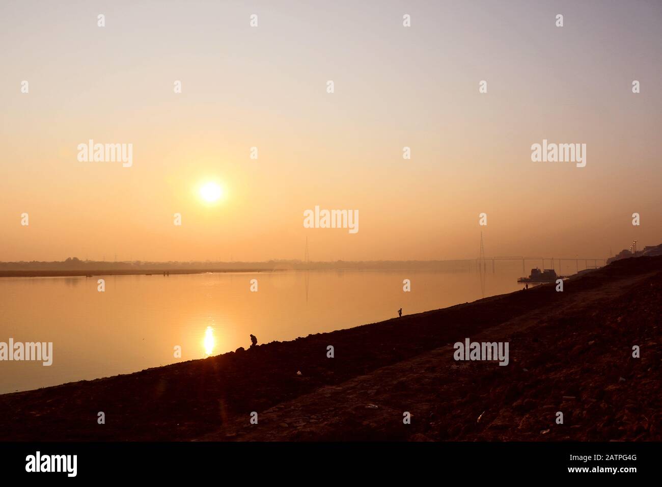 Sun rise in Varanasi opposite Ganga river Stock Photo - Alamy
