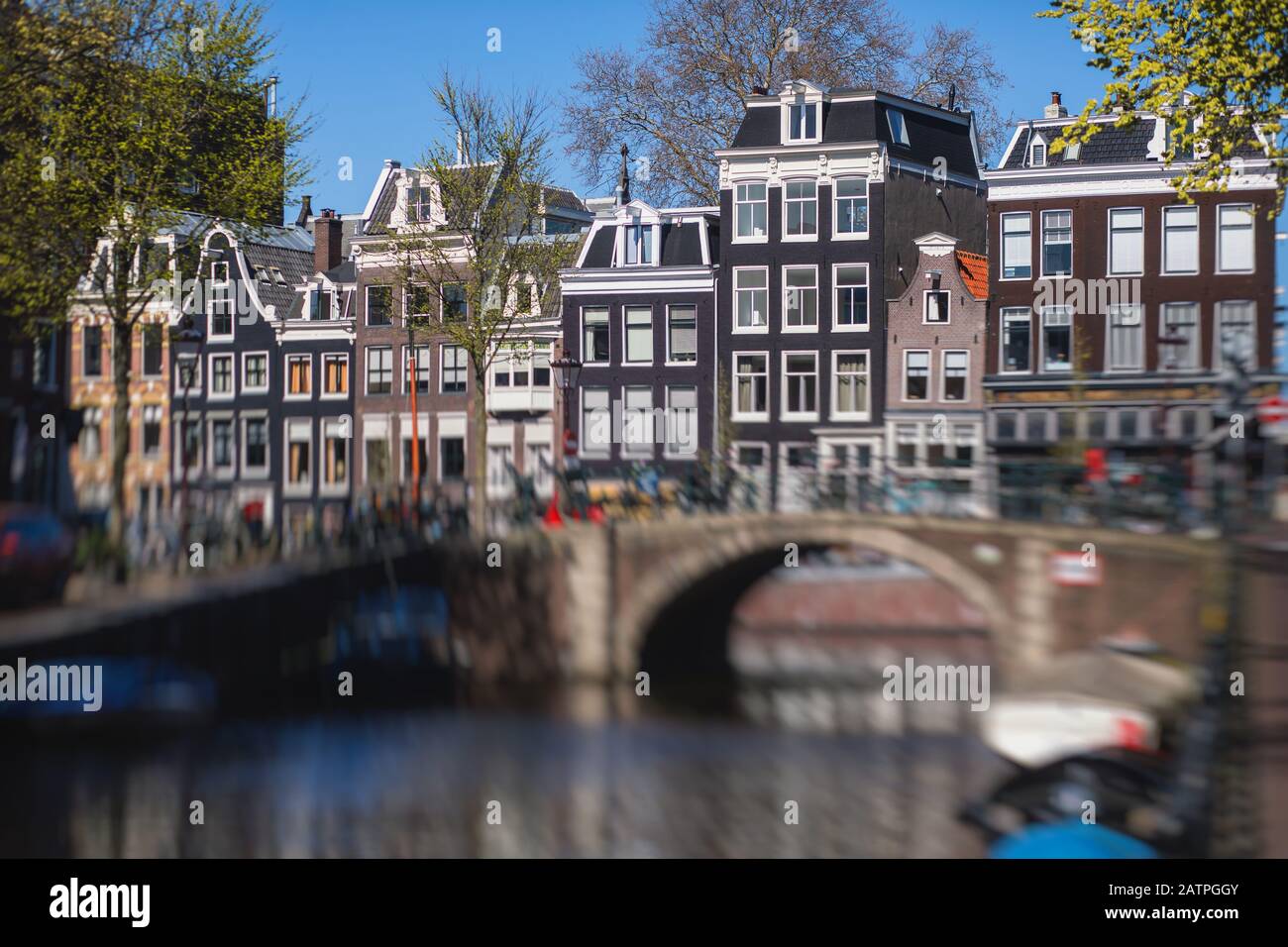 View of Amsterdam street in the historical center, with canal houses in ...