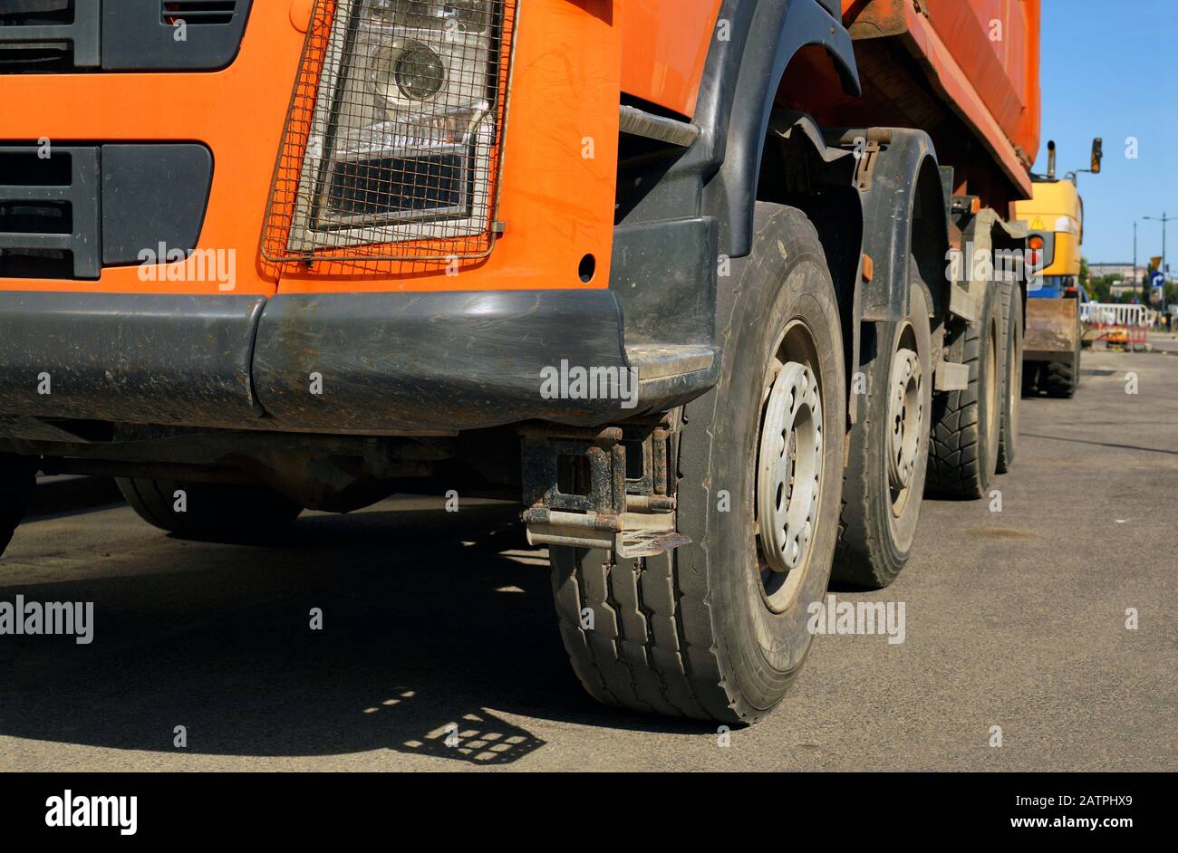 Road works. Truck and excavator on a construction site Stock Photo - Alamy